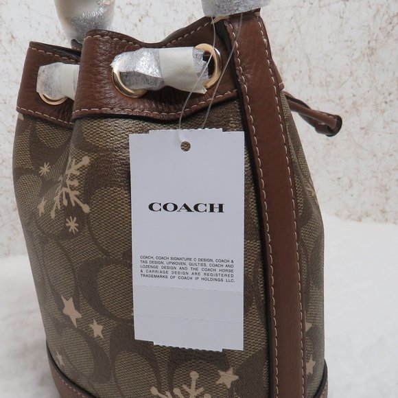 Coach | Bags | Coach Dempsey Star Snowflake Print Drawstring Bucket Bag ...